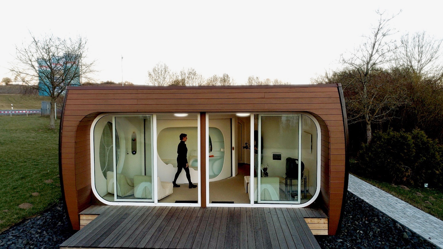 Small prefab tests space-era rotating rooms: sleep-cook-bath ...