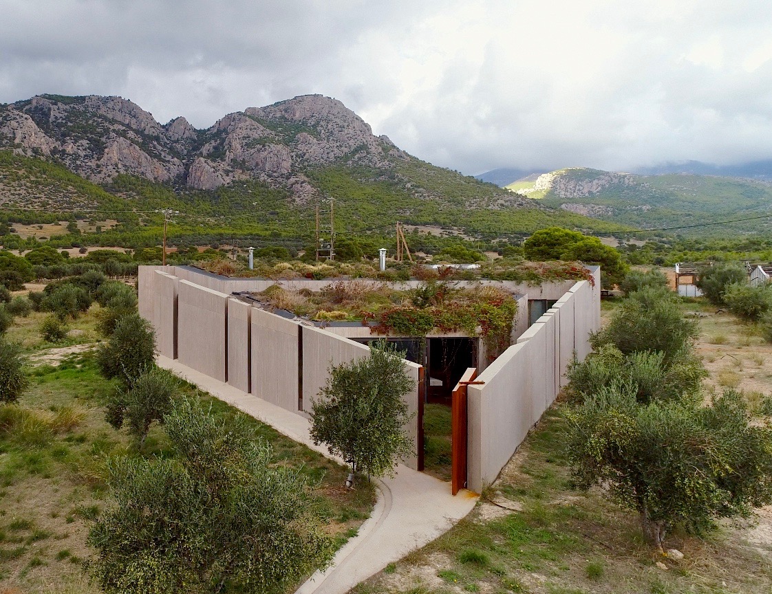 Pythagorean home amidst olive grove offers views & protection ...