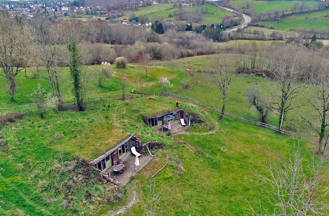 Family builds twin underground homes in ancient mountain farm ...